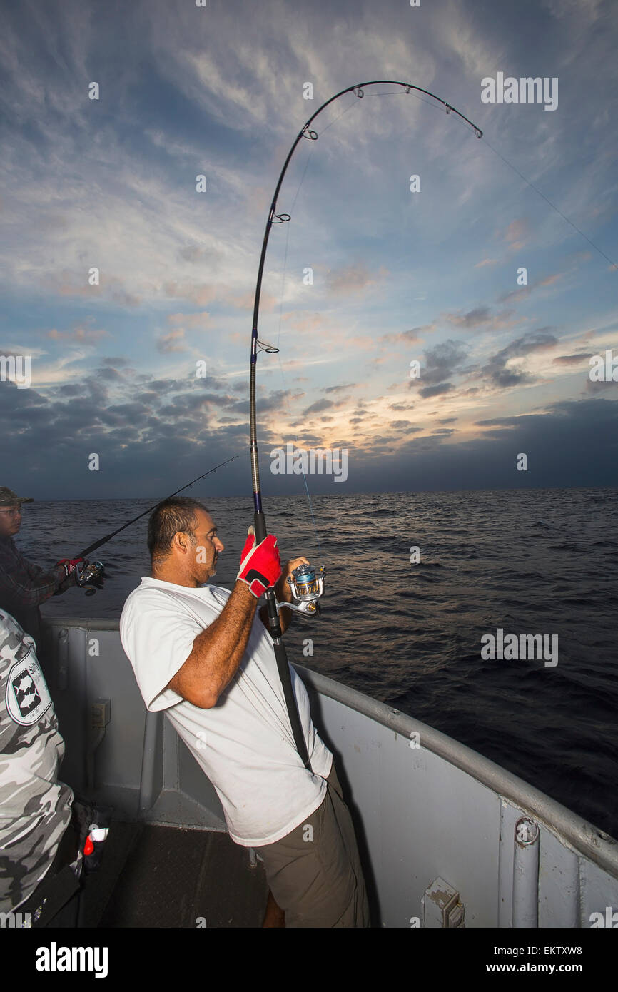 Man fishing gets a bite on his line;Corpus christi texas usa Stock ...