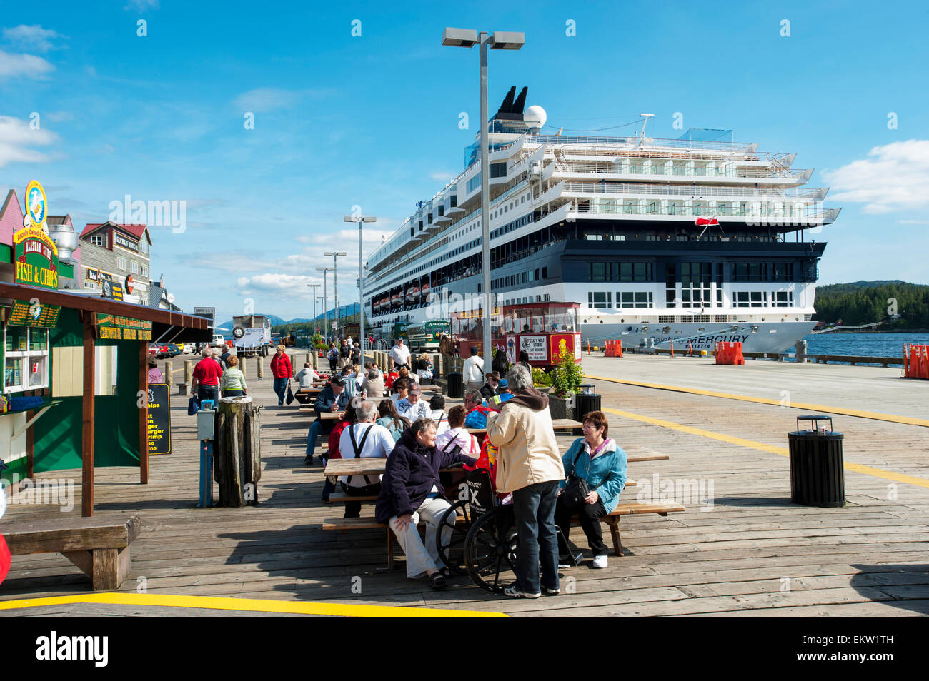 Cruise ship passengers relax on the pier in Ketchikan, Alaska Stock ...