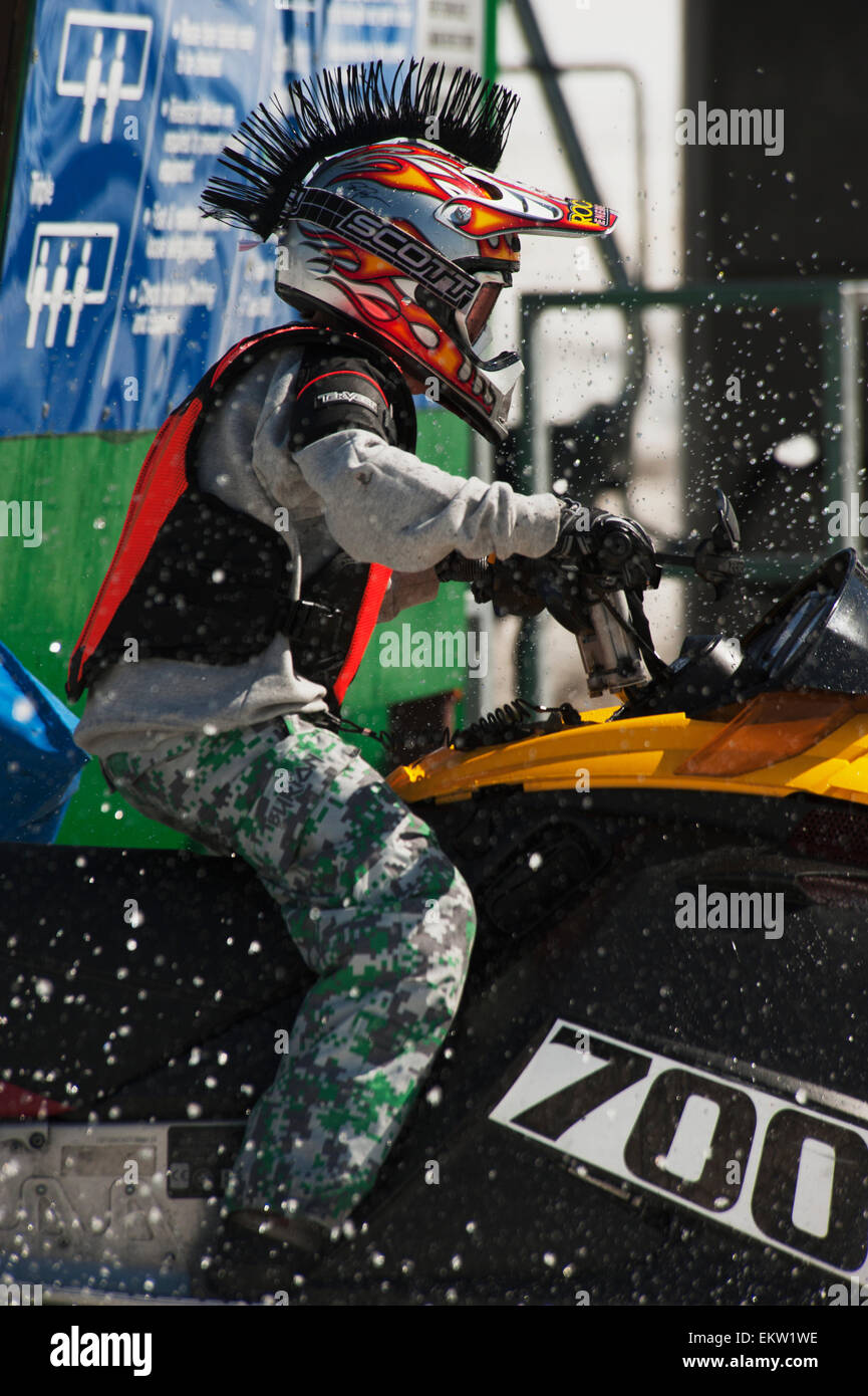 Snow machine racing through water and slush in Girdwood, Alaska Stock ...