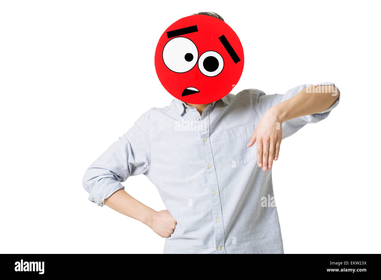 Young man with a confused emoticon face in front of his face Stock ...