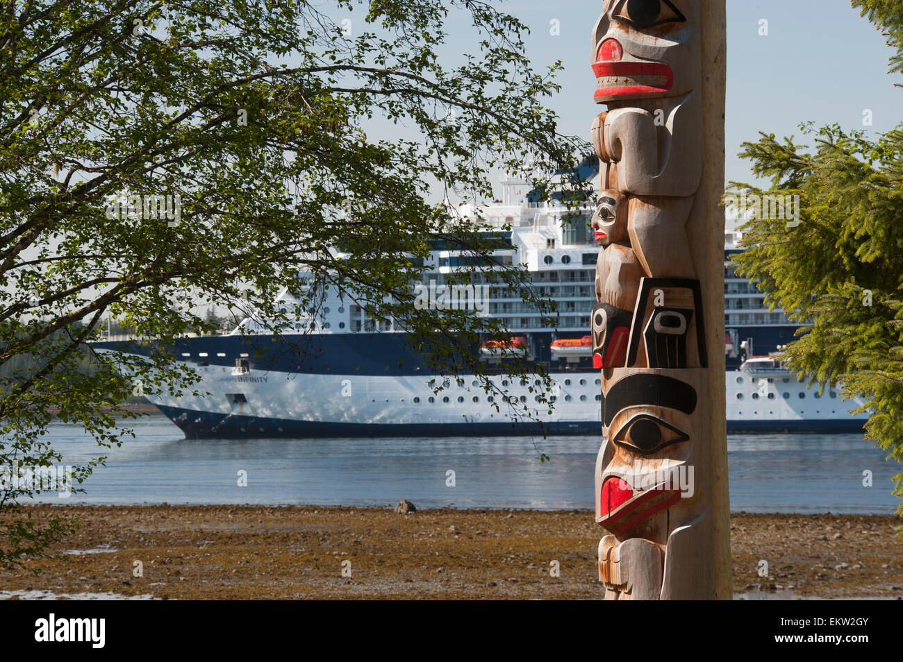 Celebrity Cruises cruise ship passes by a totem pole in Sitka ...