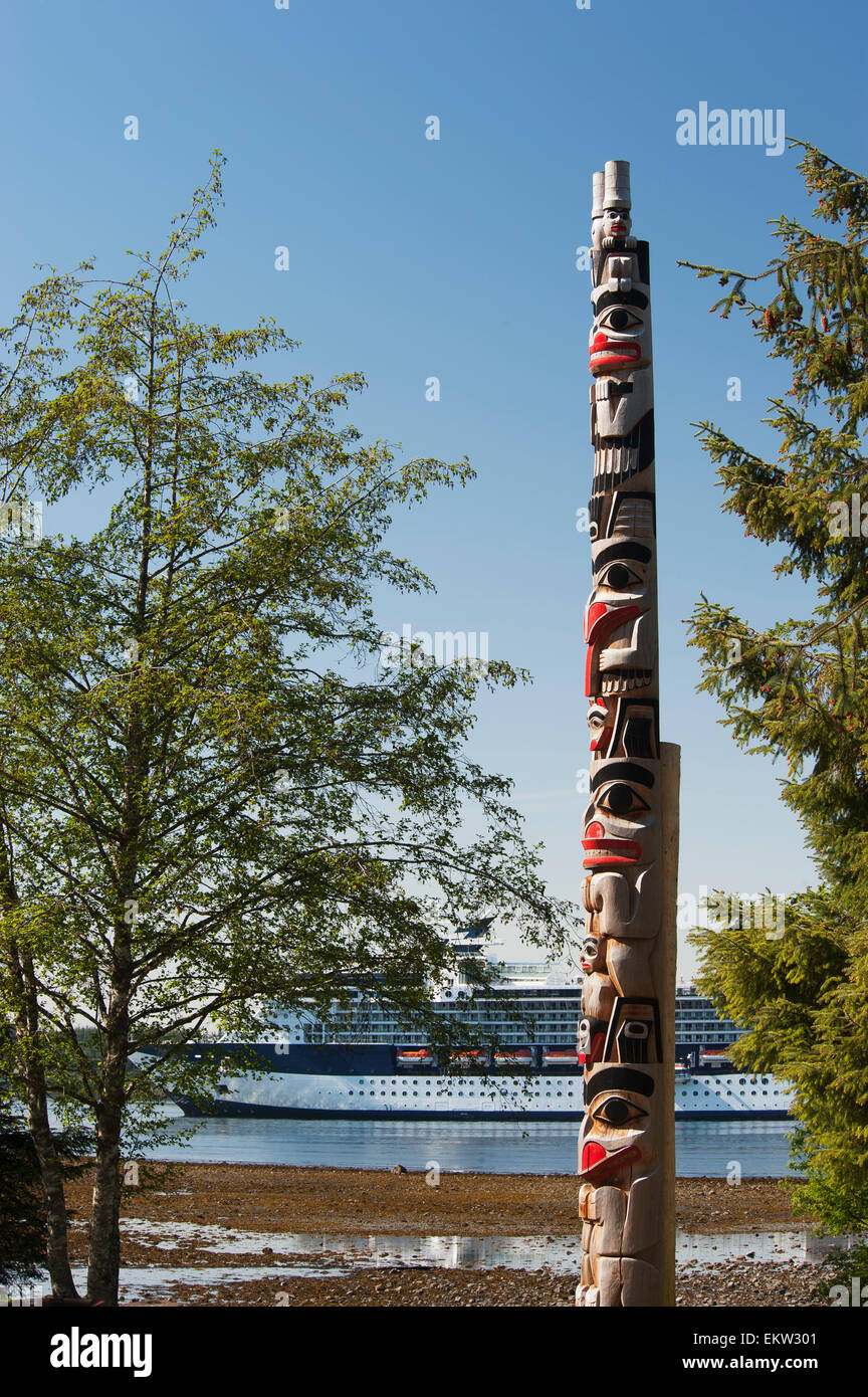 Celebrity Cruises cruise ship passes by a totem pole in Sitka ...