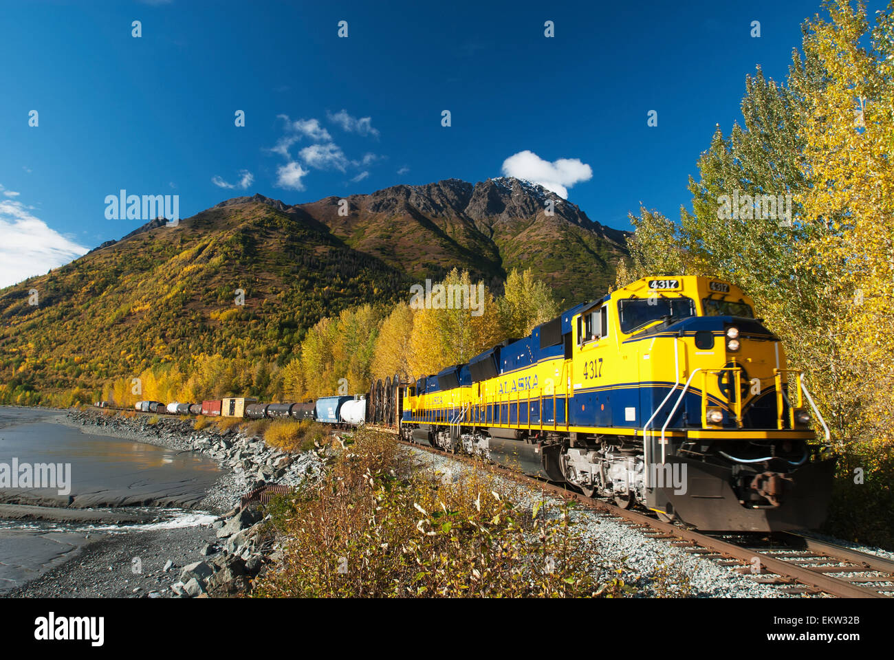 Alaska Railroad train along Turnagain Arm with fall colors ...