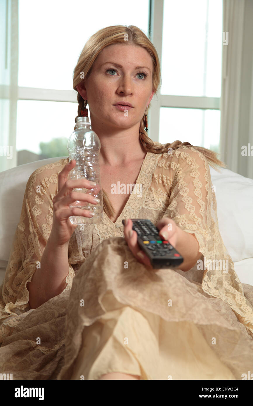 woman watching TV Stock Photo - Alamy