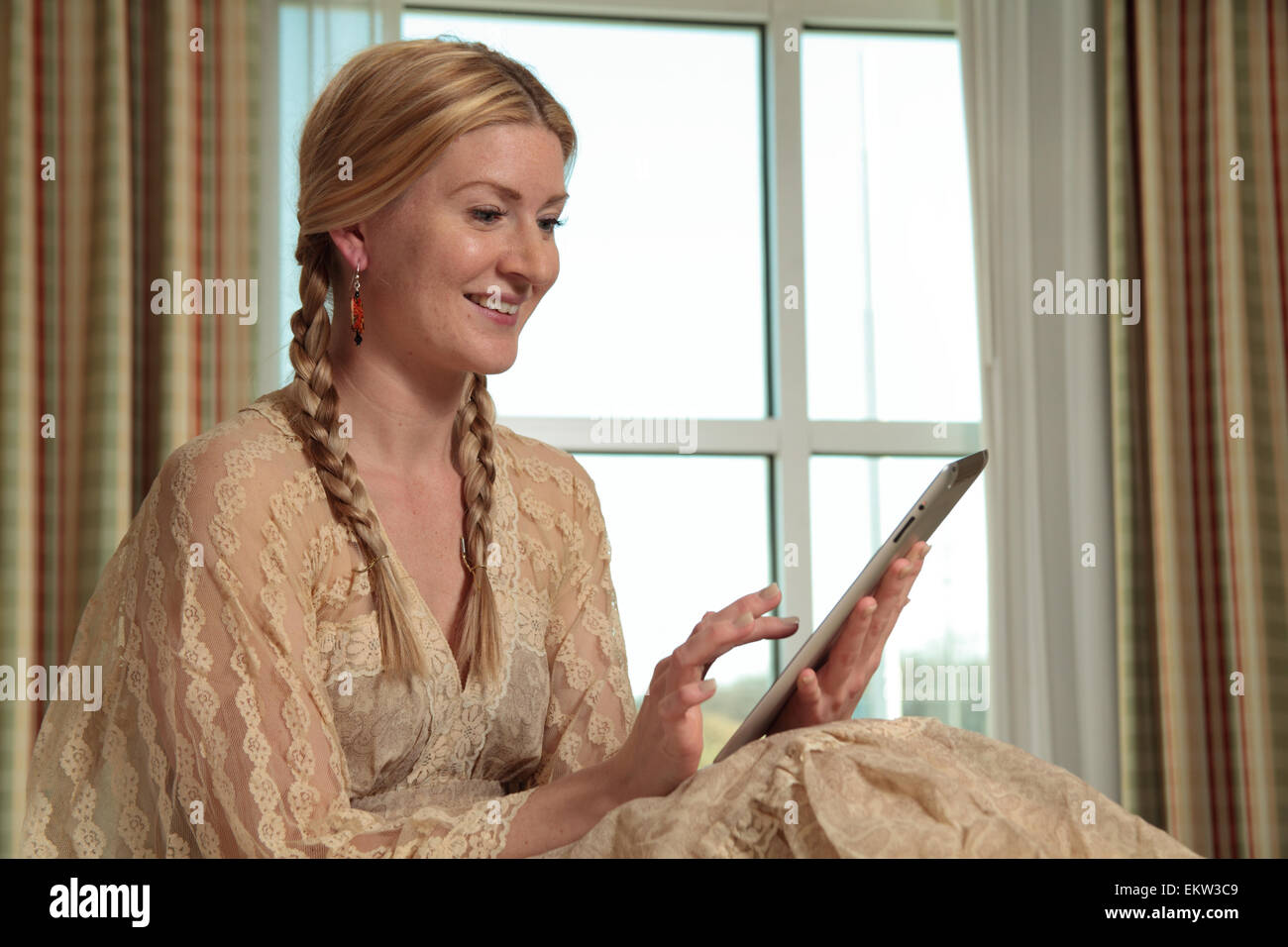 Adult using i[pad hi-res stock photography and images - Alamy