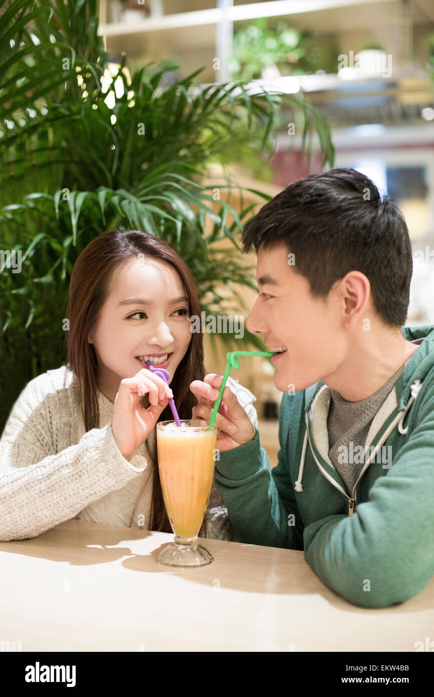 Sharing A Glass High Resolution Stock Photography and Images - Alamy