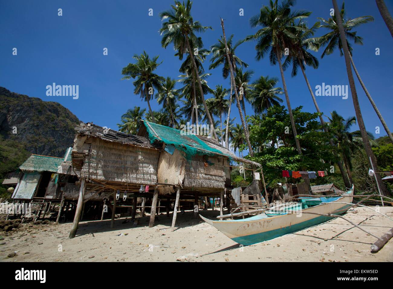 Palm-Leaf Stilt Houses On The Beach; Corong Corong, Bacuit Archipelago ...