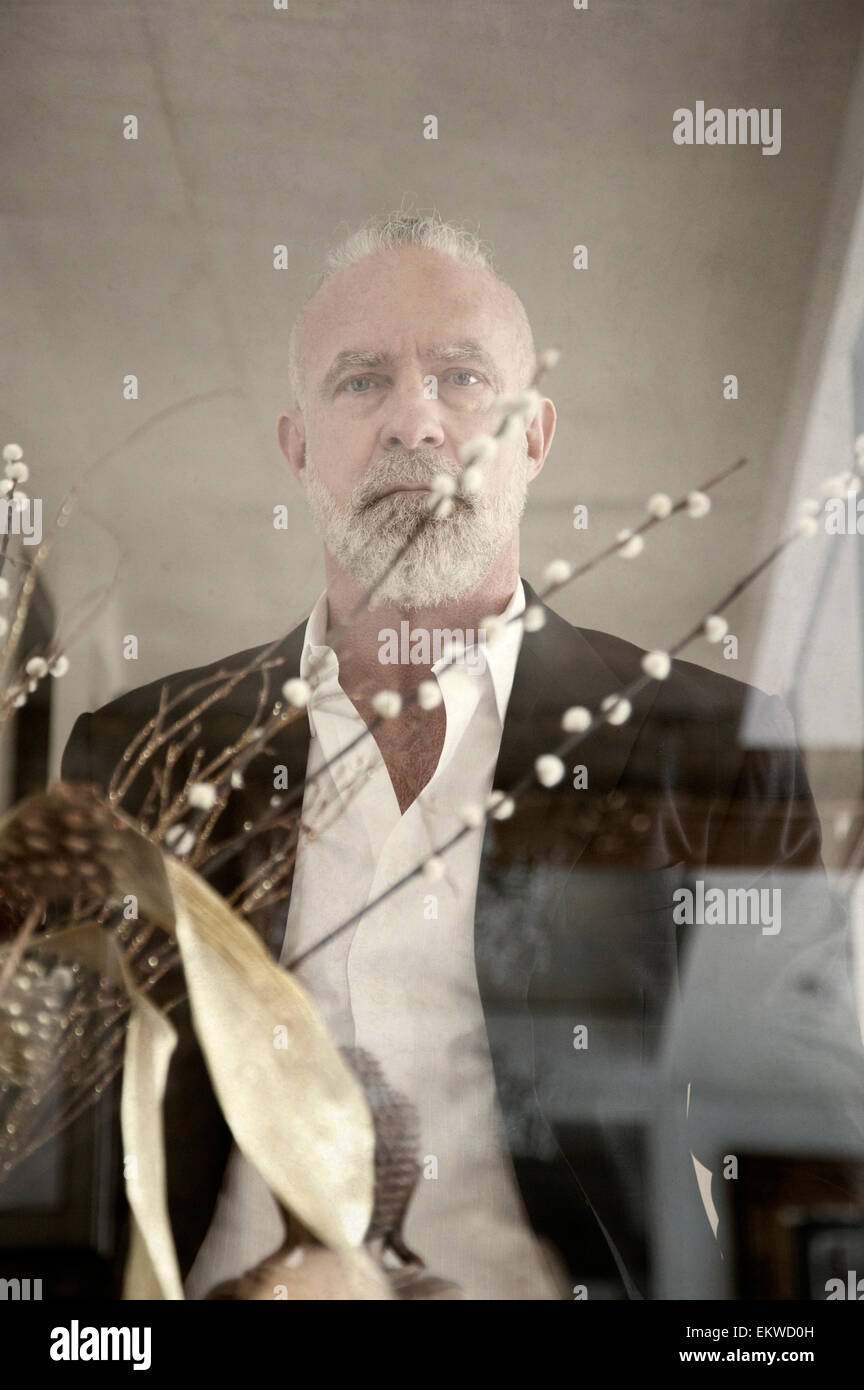 Man Behind Glass Indoors Stock Photo - Alamy