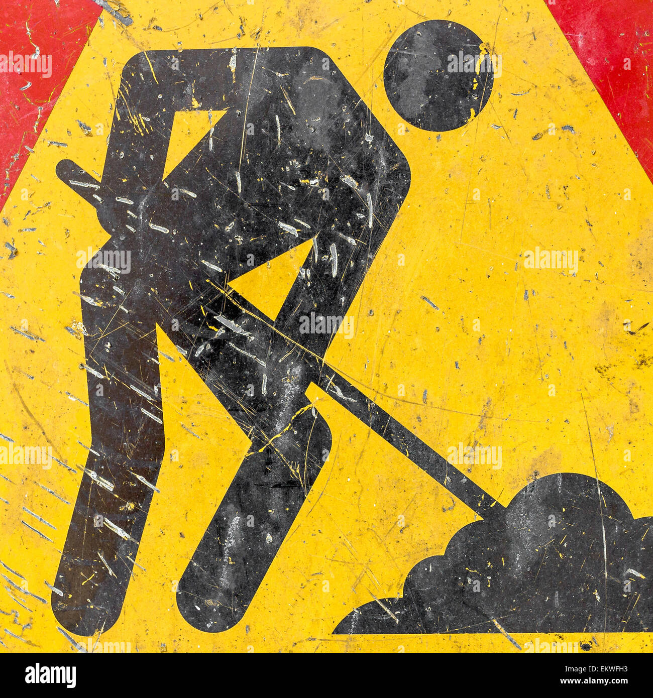 Front view of an old sign of work in progress Stock Photo - Alamy