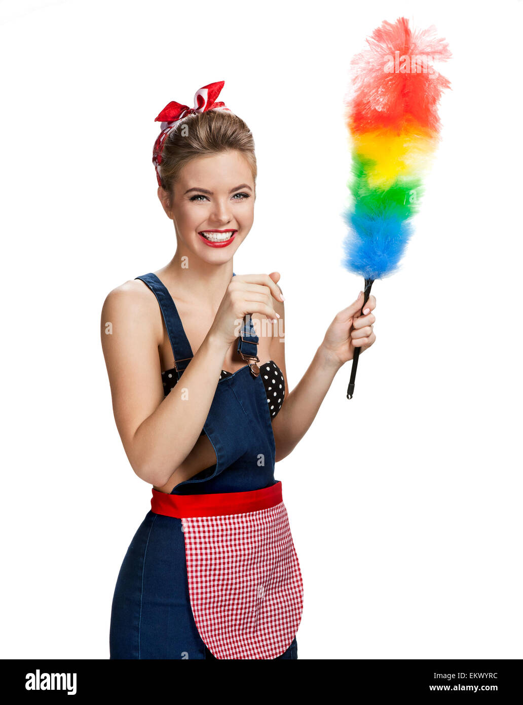 Young beautiful cleaning maid holding colorful static duster and ...