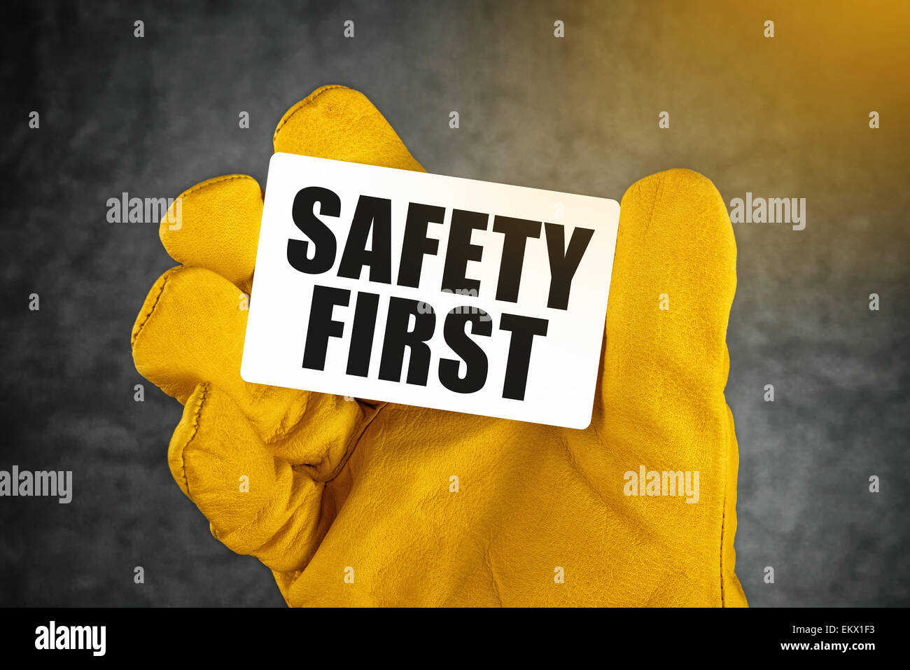 Safety First on Business Card, Male Hand in Yellow Leather Construction ...
