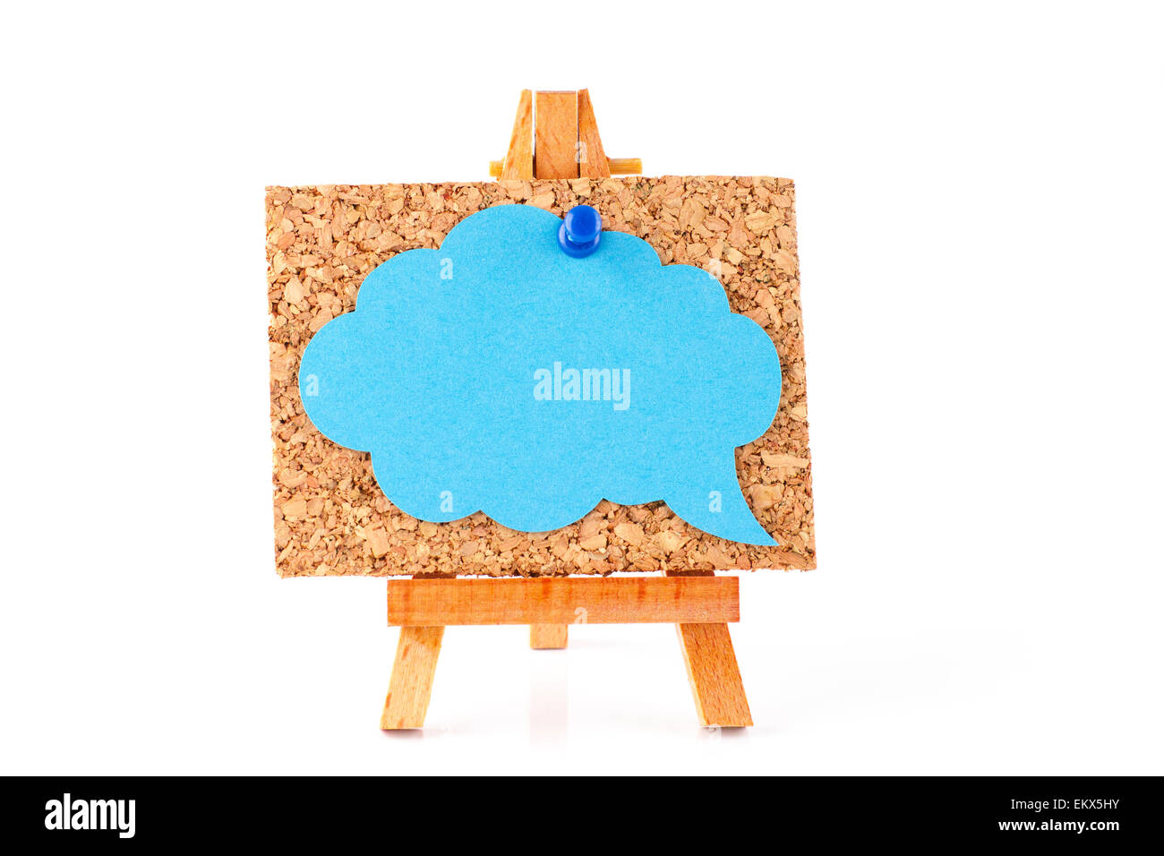 Wooden easel with cork board and blue speech bubble isolated on white ...