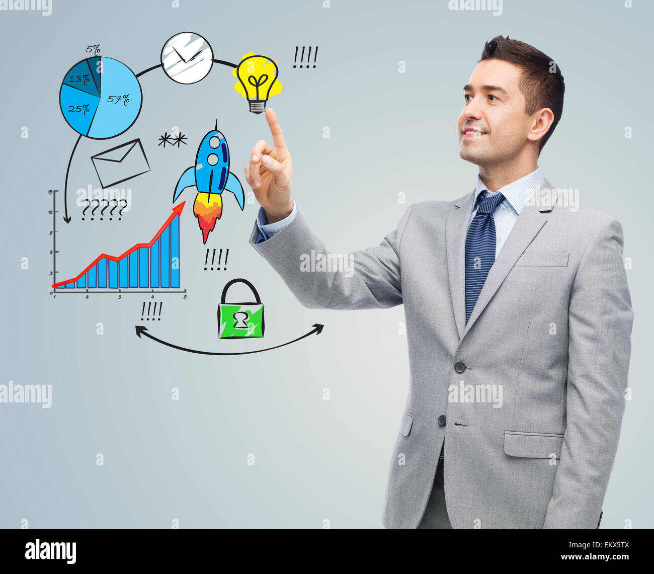 happy businessman in suit touching business scheme Stock Photo - Alamy