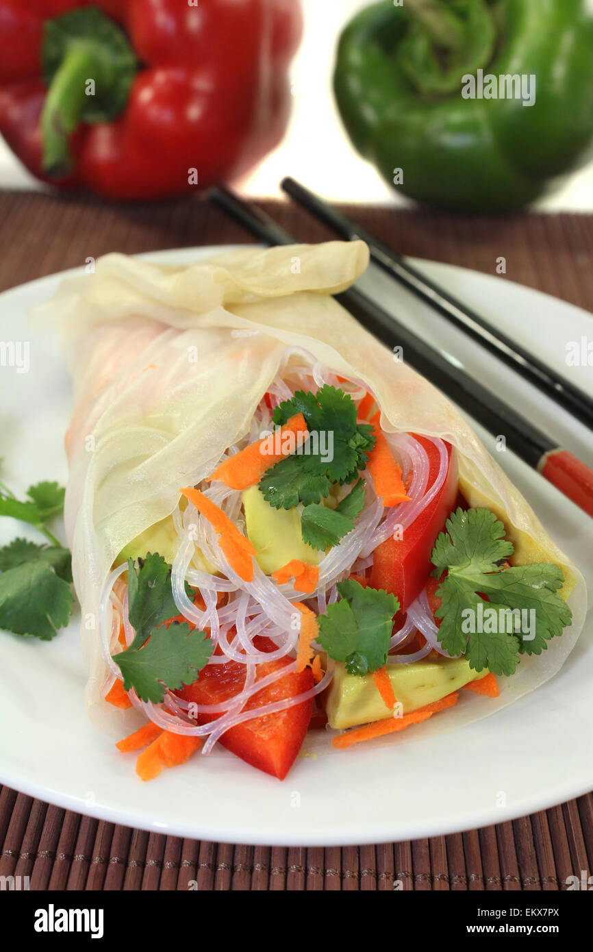 Rice paper stuffed with glass noodles, carrots, peppers and cilantro ...