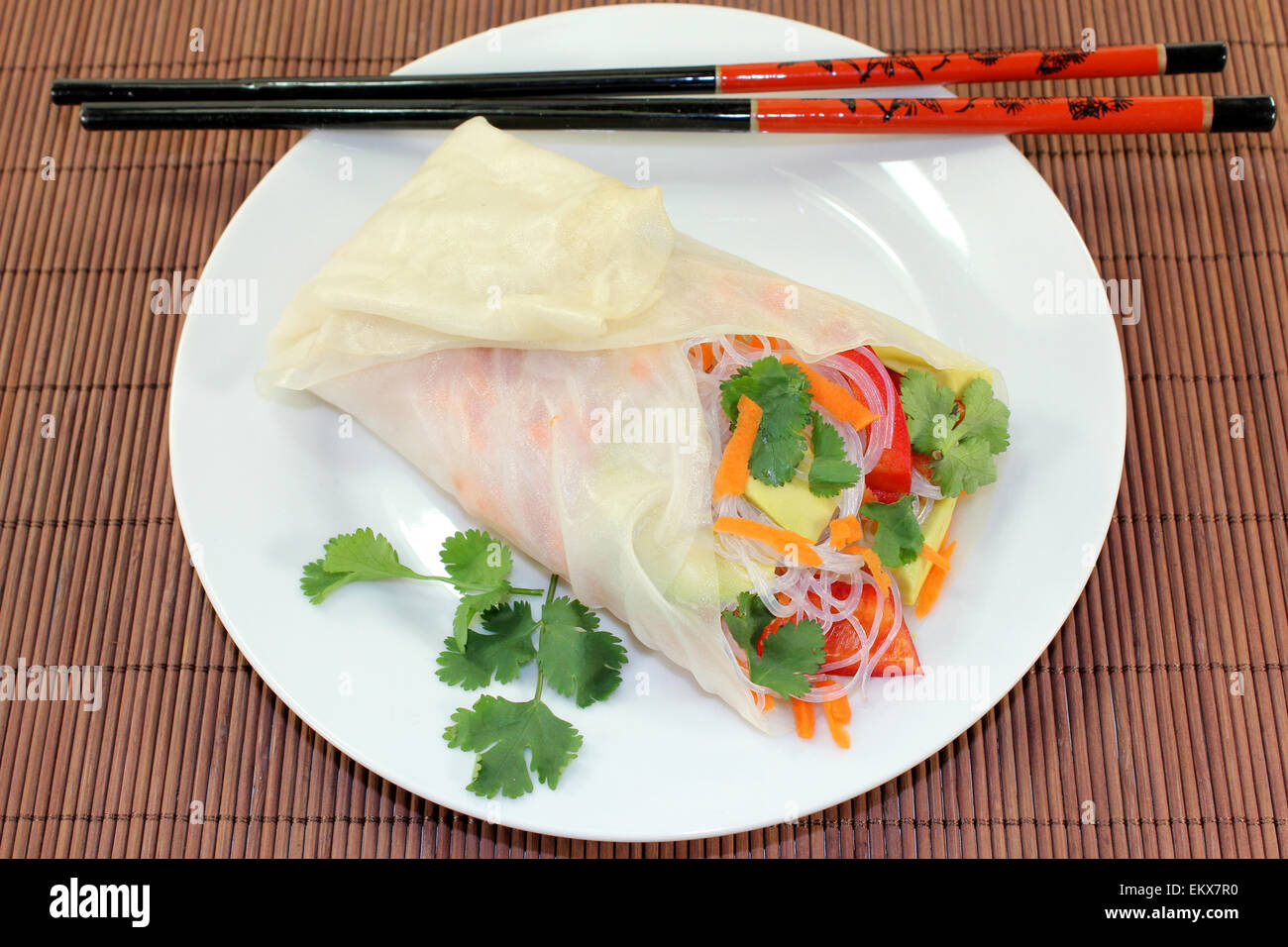 Rice paper stuffed with glass noodles, carrots, peppers and cilantro ...