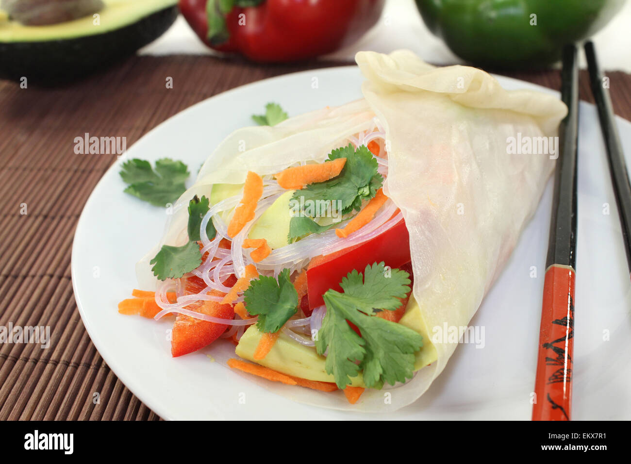 Rice paper stuffed with glass noodles, carrots, peppers and cilantro ...