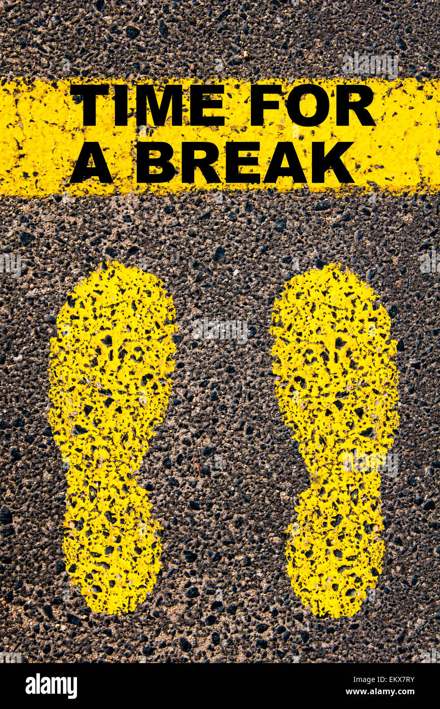 Time for a Break message. Conceptual image with yellow paint footsteps ...
