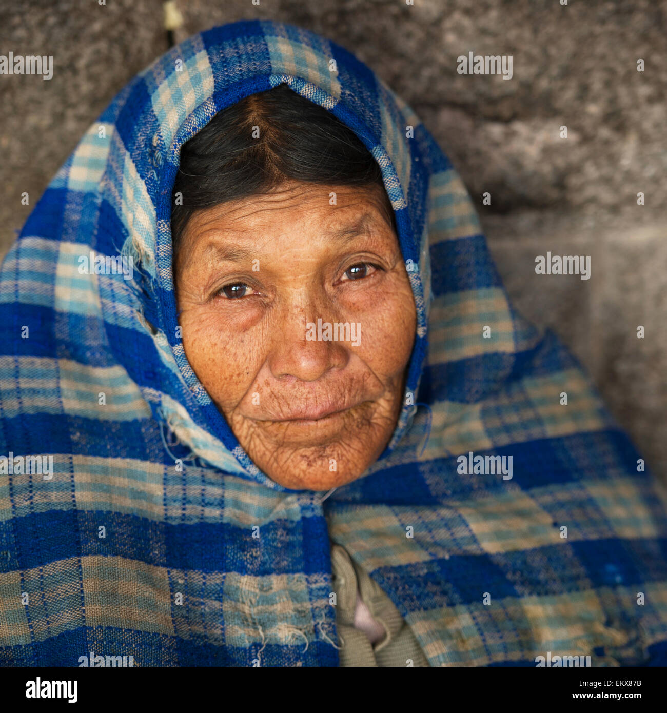 Portrait Of A Woman With A Plaid Fabric Over Her Head; Cusco Peru Stock ...