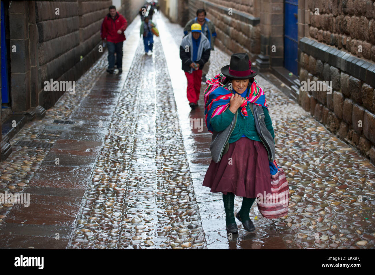 People Walking Up The Wet Street; Cusco Peru Stock Photo - Alamy