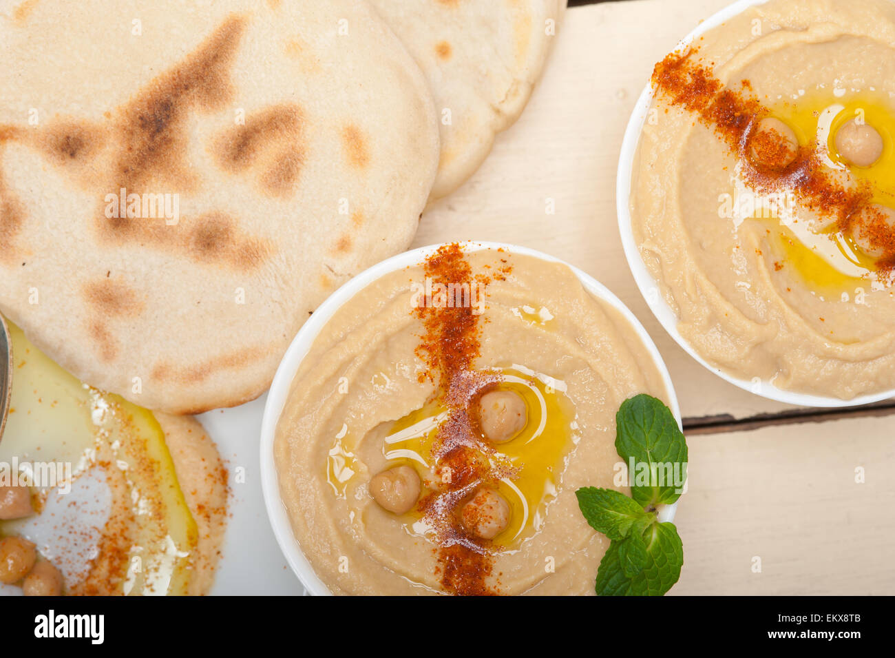 traditional chickpeas Hummus with pita bread and paprika on top Stock ...