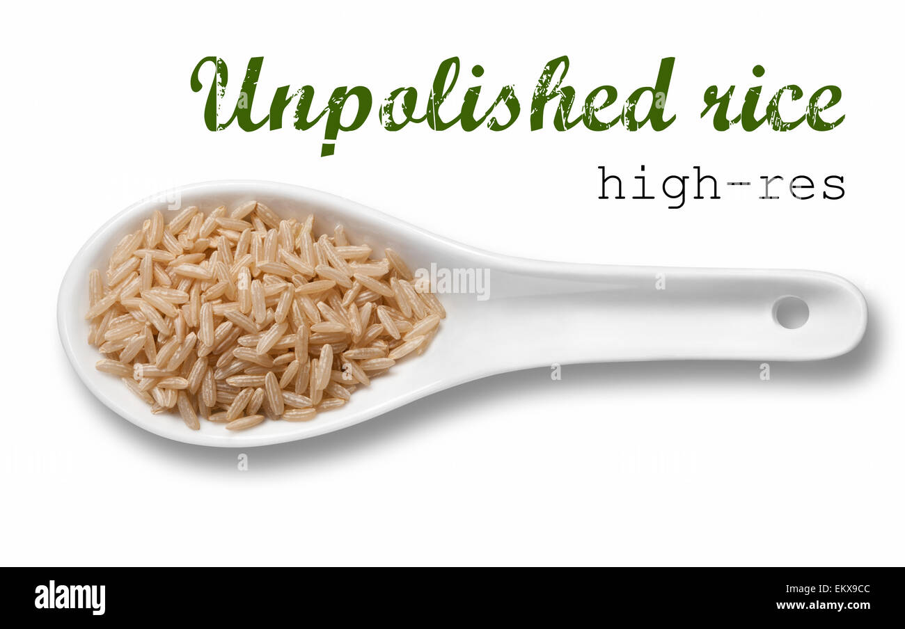 Unpolished rice in white porcelain spoon / high resolution product ...