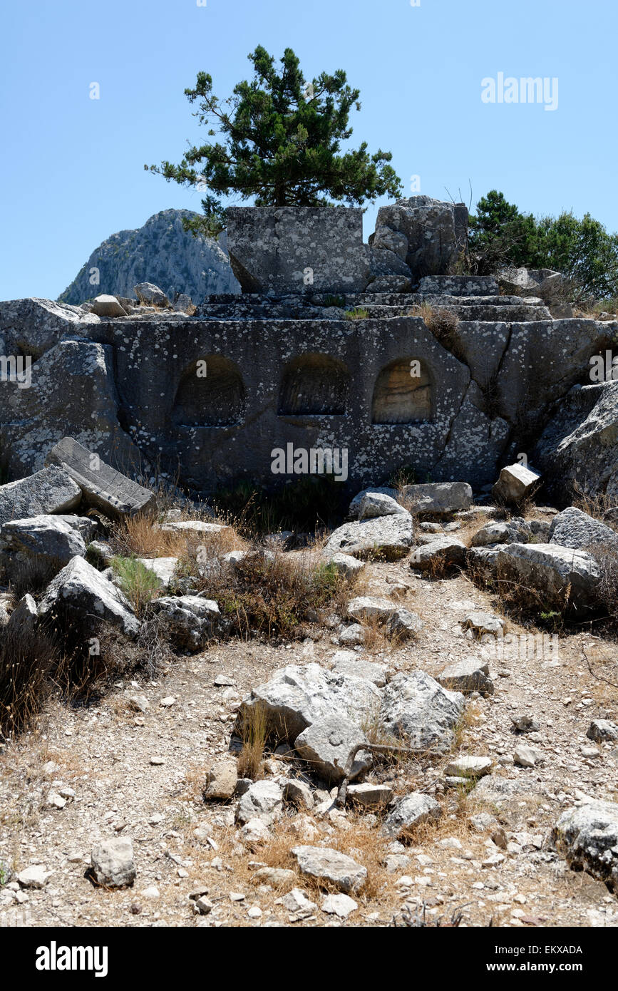 Three rock cut semicircular niches which were part of the heroon which ...