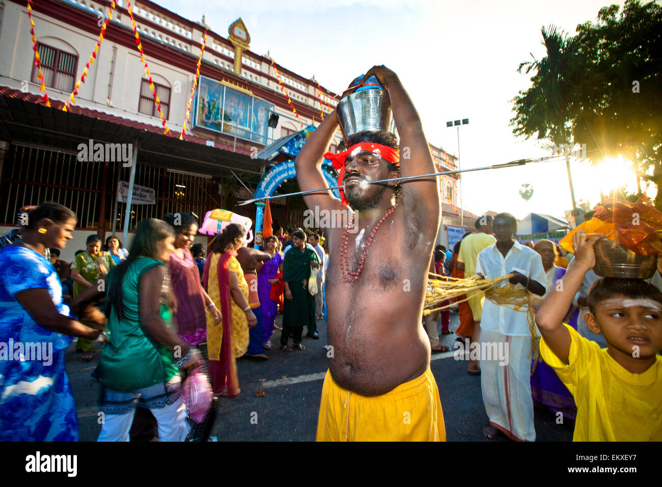 Men And Children Performing A Hindu Ritual For The Thaipusam Festival ...