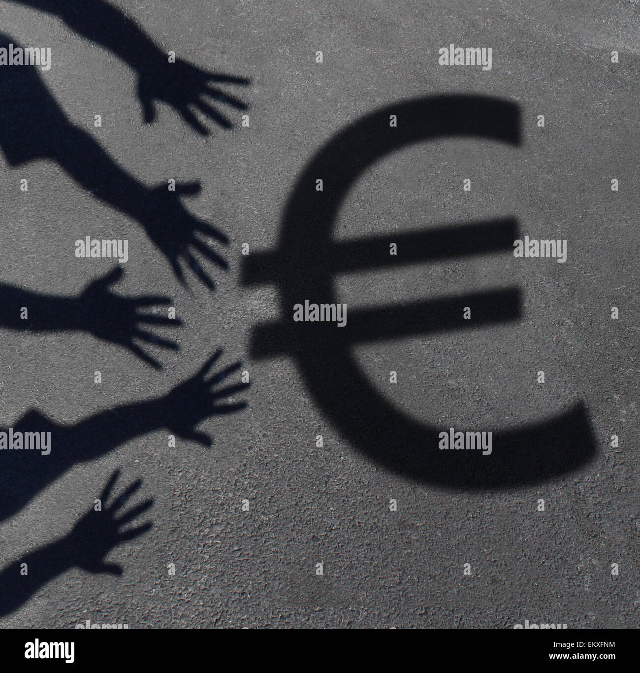 Euro demand as the cast shadow of a group of hands reaching out to grab ...