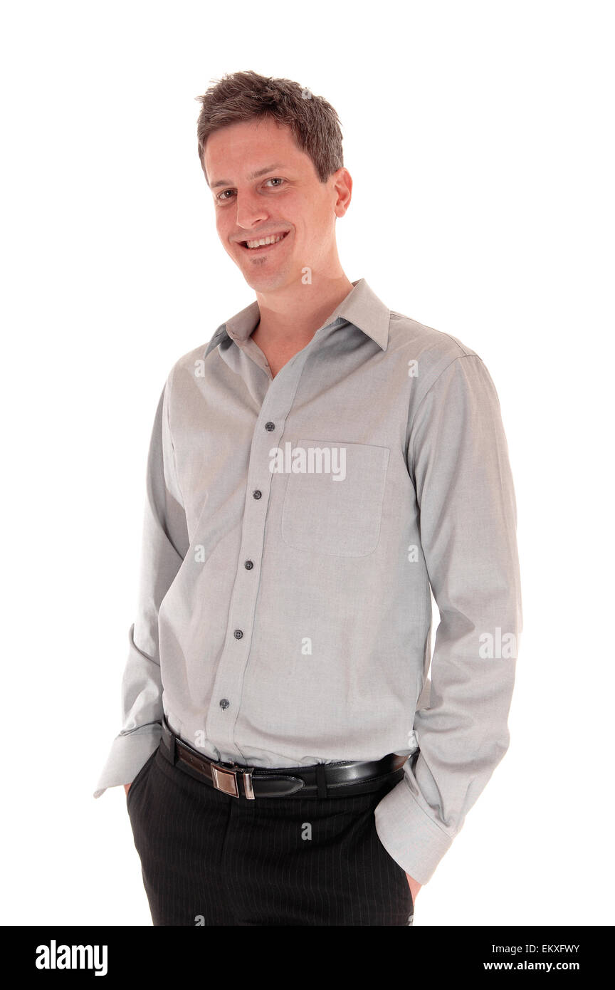 A portrait picture of a handsome young man with his hands in his pocked ...