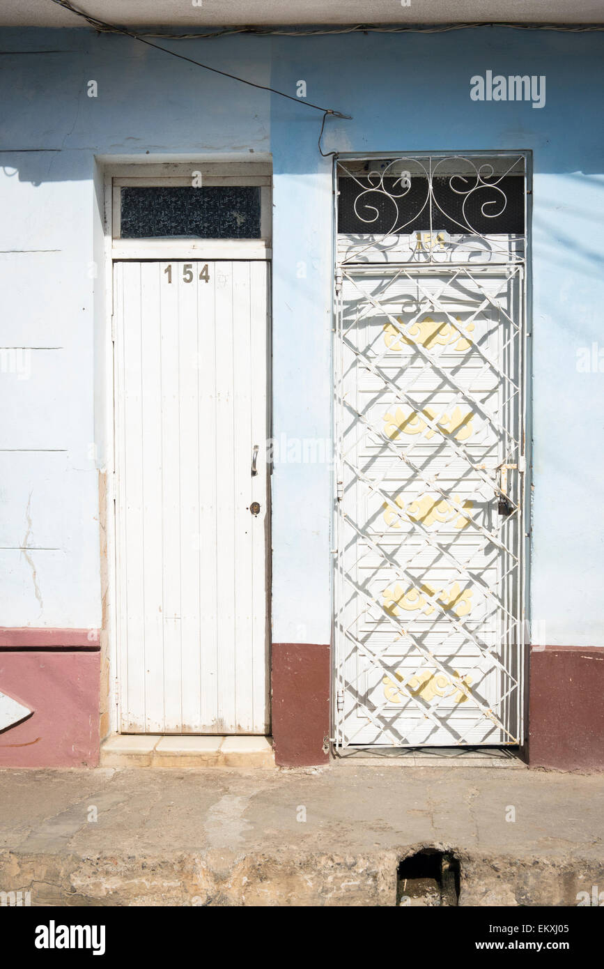 Cuba Trinidad typical wooden doors & metal decorative grill Stock Photo ...