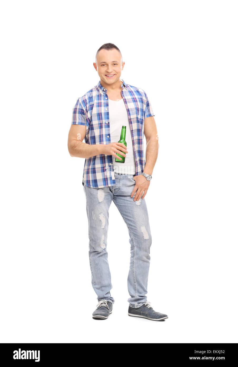 Full length portrait of a casual young man holding a bottle of beer and ... Full length portrait of a casual young man holding a bottle of beer and ...