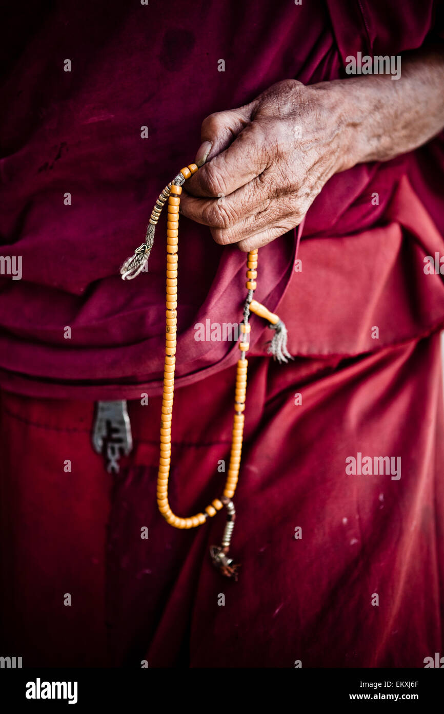 An Old Buddhist Monk Counts Prayer Beads; Ladakh Jammu And Kashmir ...
