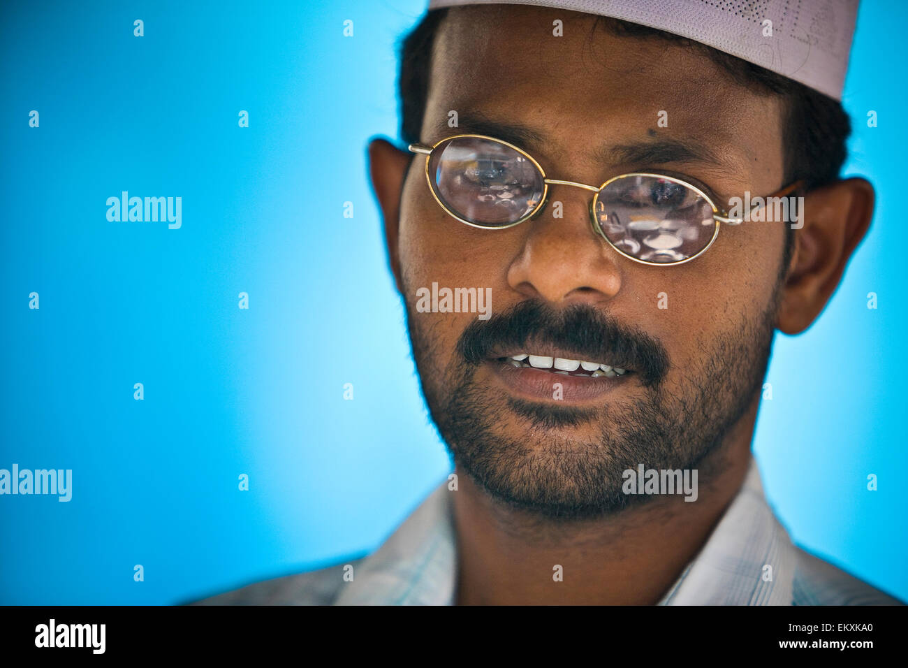 Portrait Of A Man Wearing A Prayer Cap And Eyeglasses Stock Photo - Alamy