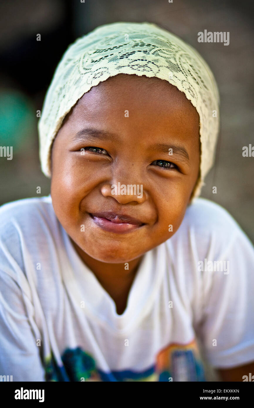 Portrait Of A Malaysian Girl Wearing A Yellow Lace Cap; Pulau ...