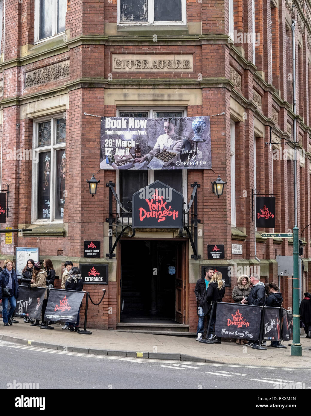 A British tourist attraction - the York Dungeon entrance with queues ...