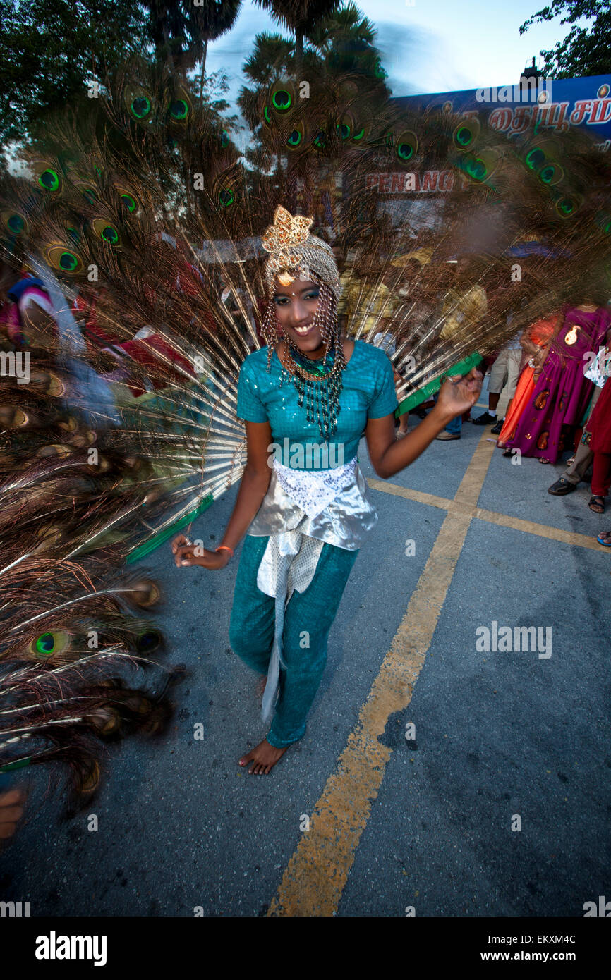 A Young Woman Performing A Hindu Ritual For The Thaipusam Festival On ...