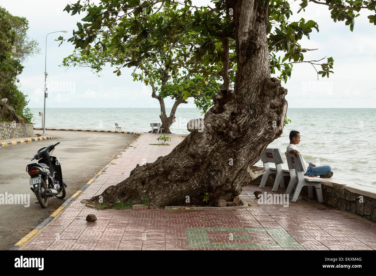 A lone Cambodian dreamer Stock Photo - Alamy