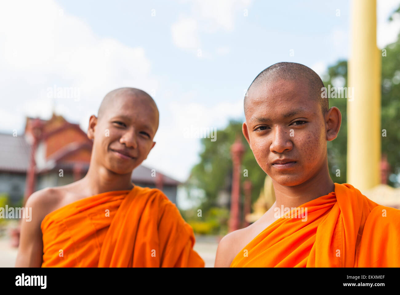 Young monk standing outside a temple hi-res stock photography and ...