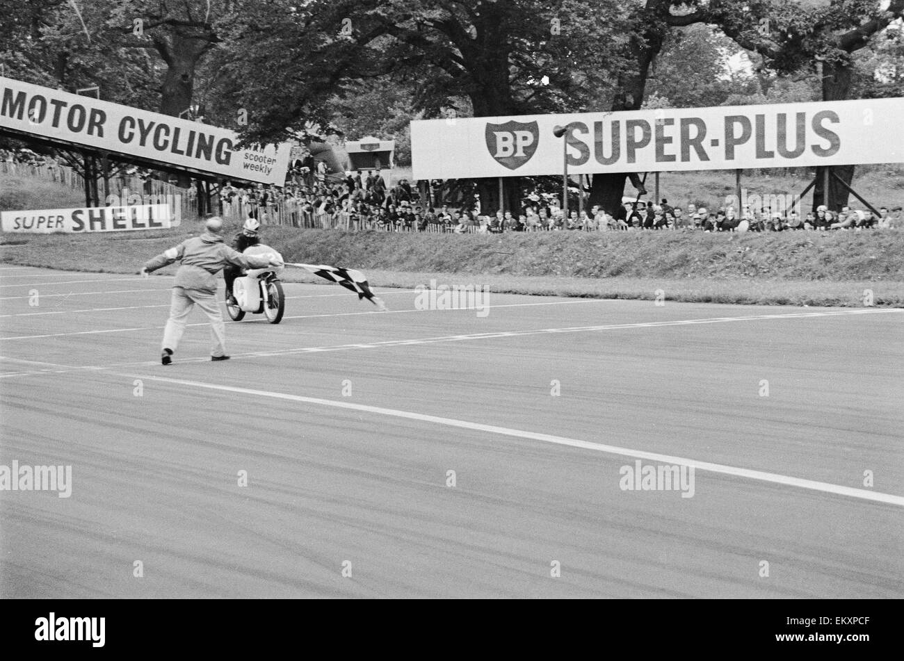 Motor Cycle Racing at oulton Park. Phil read takes the chequered flag ...