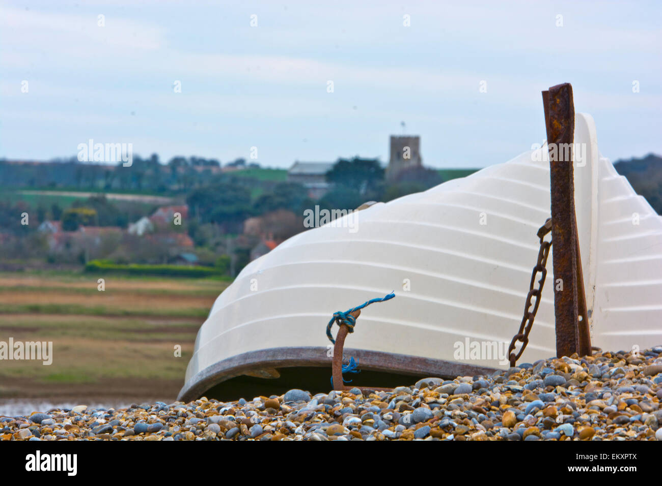 Small rowing boat shingle beach Stock Photo - Alamy