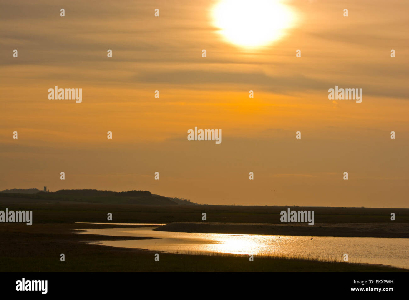 Sunset Salt marsh drainage ditch grazing marsh Nature reserve Stock ...