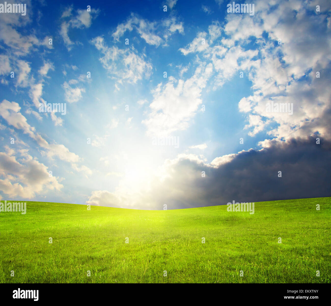 green field and beautiful sunset Stock Photo - Alamy
