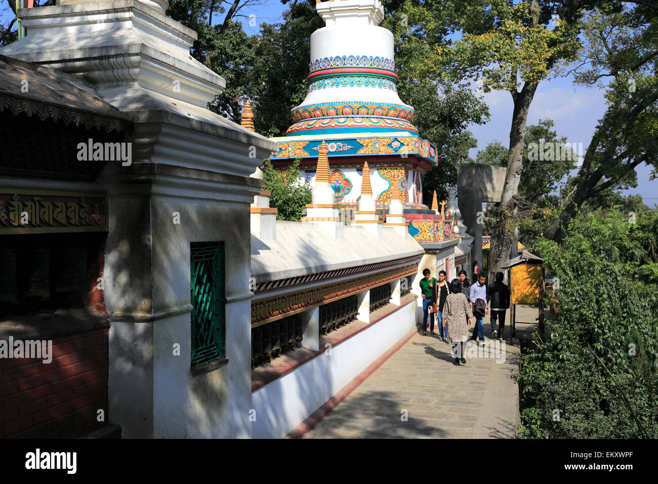 Part of the 245 foot long prayer wheel wall and Buddhist Stupas built ...