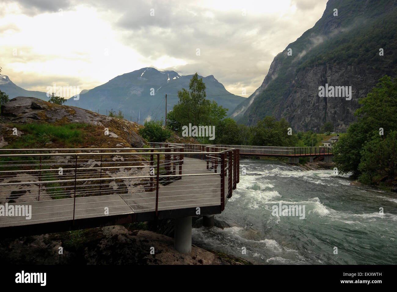 Boardwalk along a riverwalk, Geiranger, Norway, Scandinavia, Europe ...