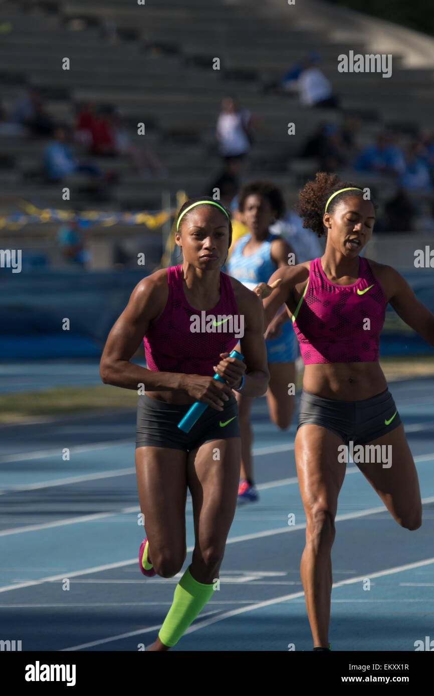 Allyson Felix takes the baton during a relay race at Drake Stadium UCLA ...