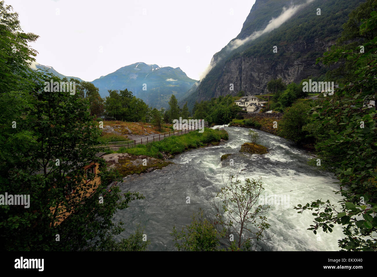Tourists along a riverwalk, Geiranger, Norway, Scandinavia, Europe ...