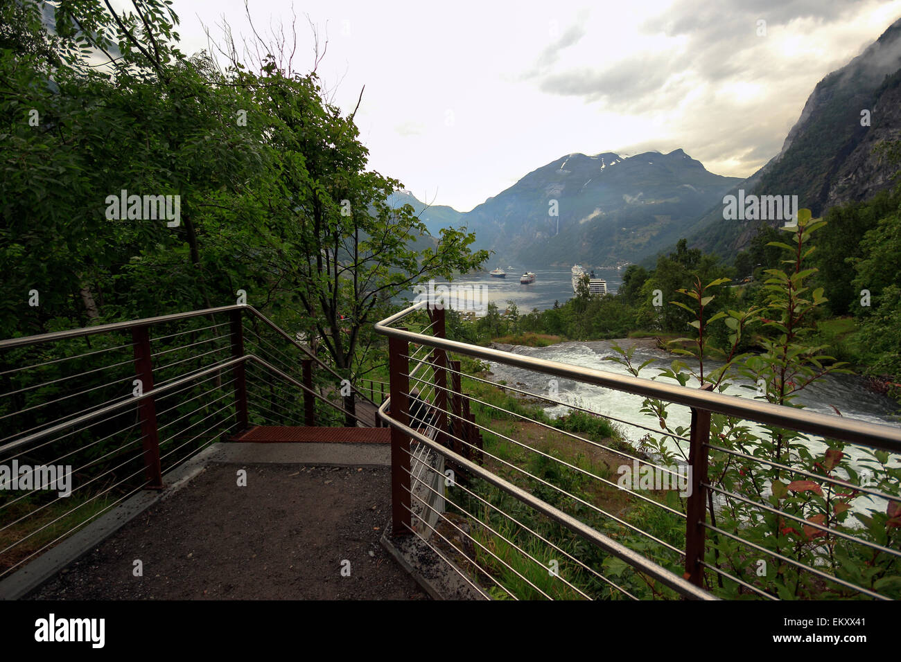 Tourists along a riverwalk, Geiranger, Norway, Scandinavia, Europe ...