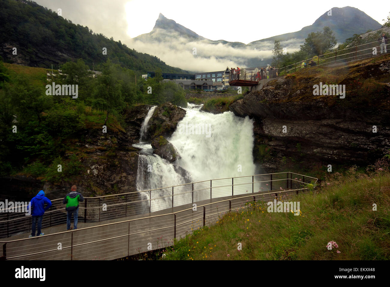 Tourists along a riverwalk, Geiranger, Norway, Scandinavia, Europe ...