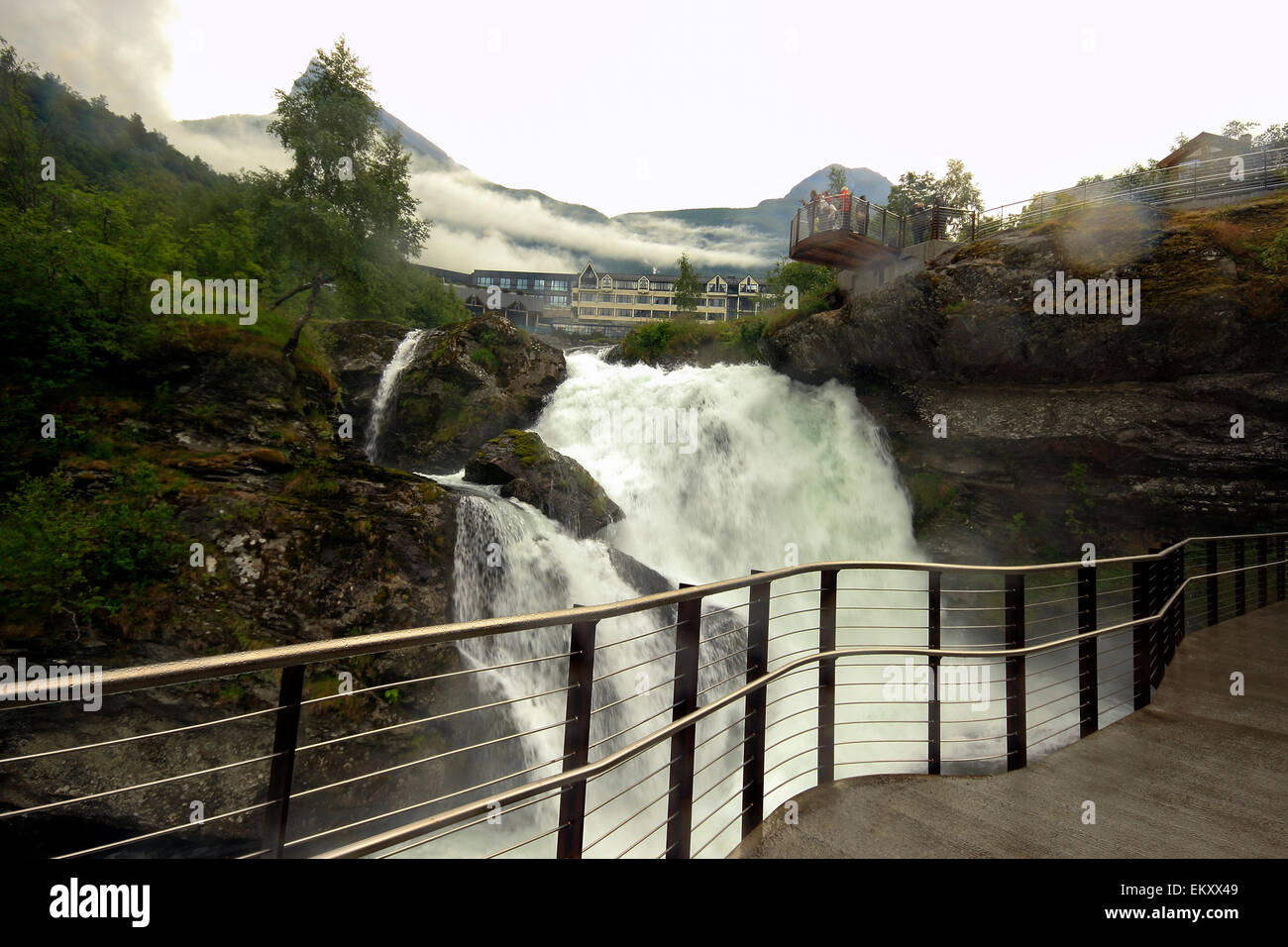 Tourists along a riverwalk, Geiranger, Norway, Scandinavia, Europe ...