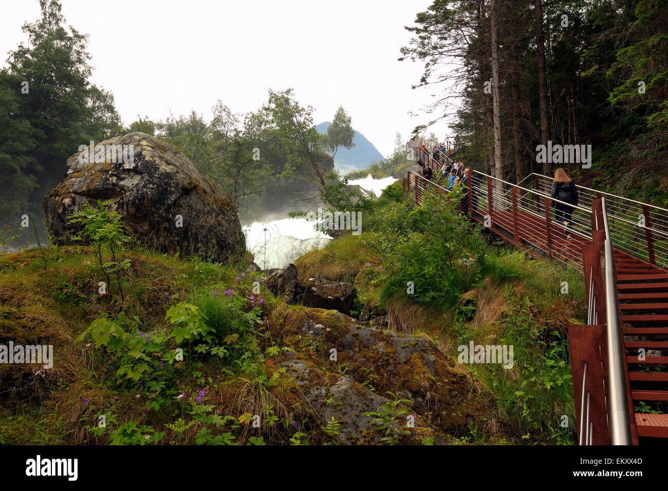 Tourists along a riverwalk, Geiranger, Norway, Scandinavia, Europe ...
